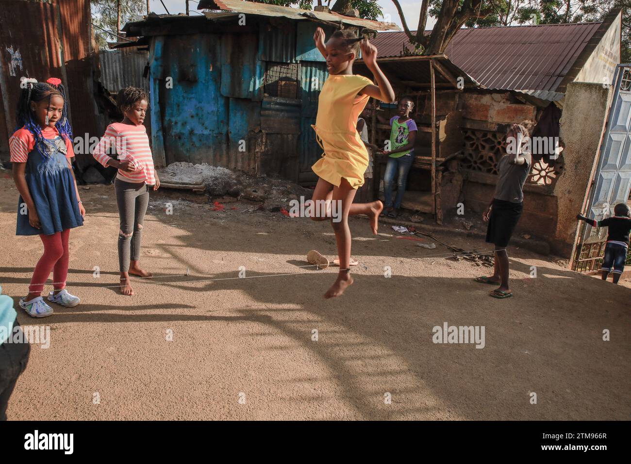 Kids playing outside the streets in Kibera Slum, Nairobi. A view ...