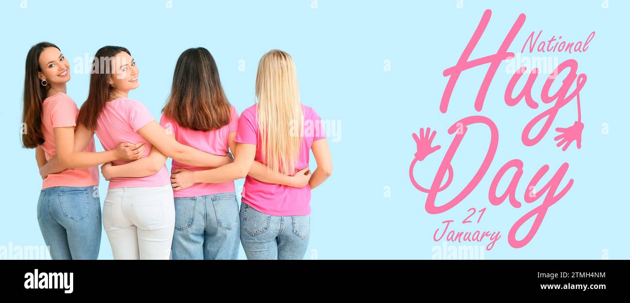 Portrait of hugging young women on blue background. National Hugging ...