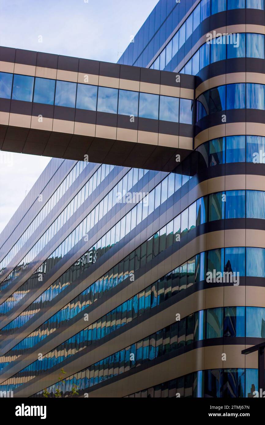 Wide angle shot of a modern colorful building of a corporation with ...