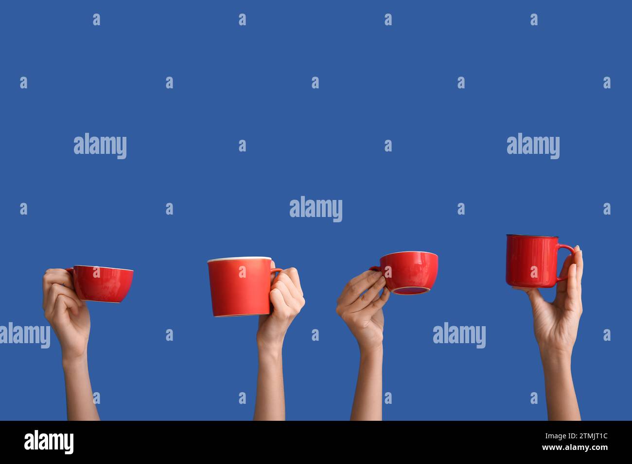 Female hands with different cups on color background Stock Photo - Alamy