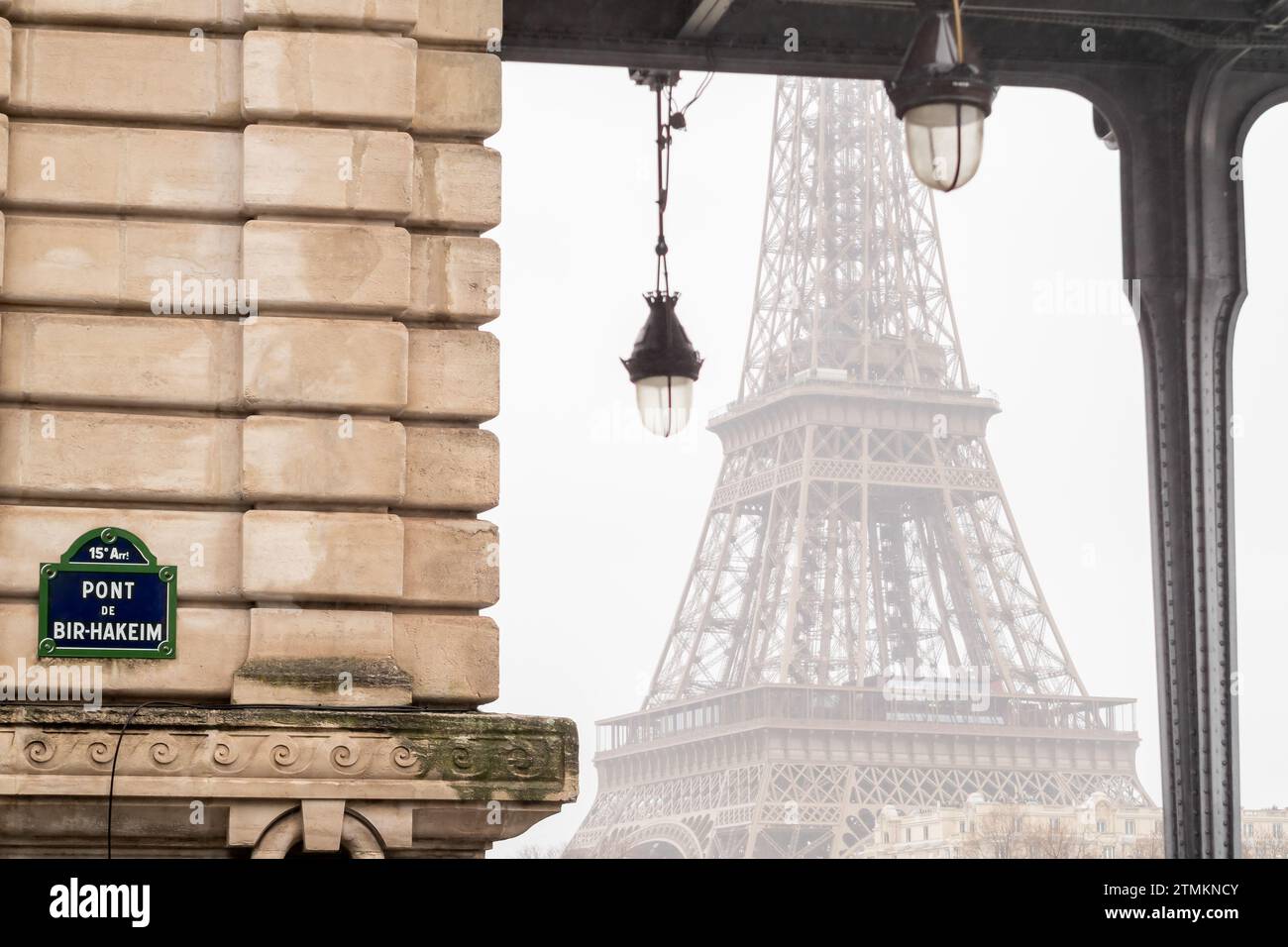 The Eiffel Tower from the Bir Hakeim bridge in the rain at the start of ...