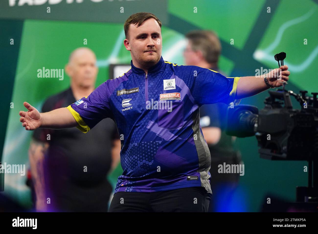 Luke Littler reacts during his match against Christian Kist (not ...
