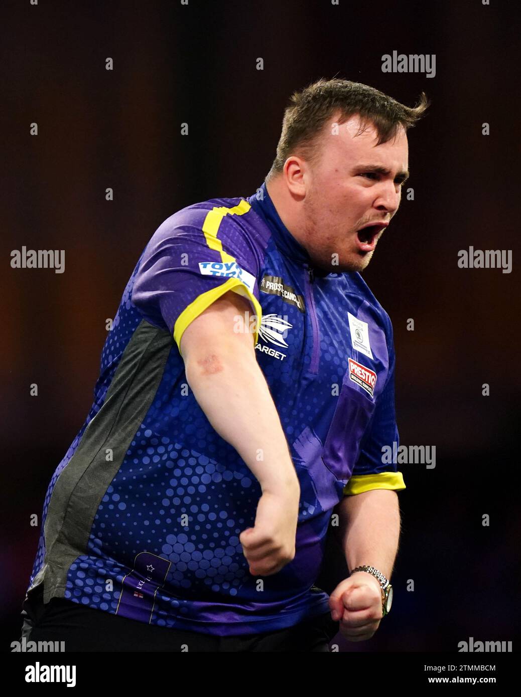 Luke Littler reacts during his match against Christian Kist (not ...