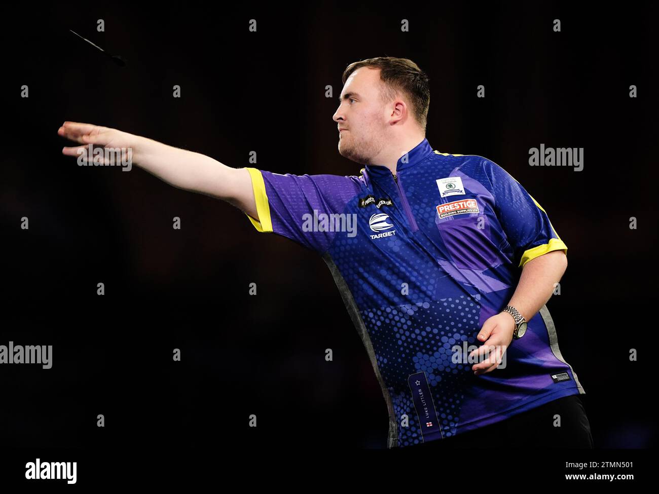 Luke Littler in action against Christian Kist (not pictured) on day six ...
