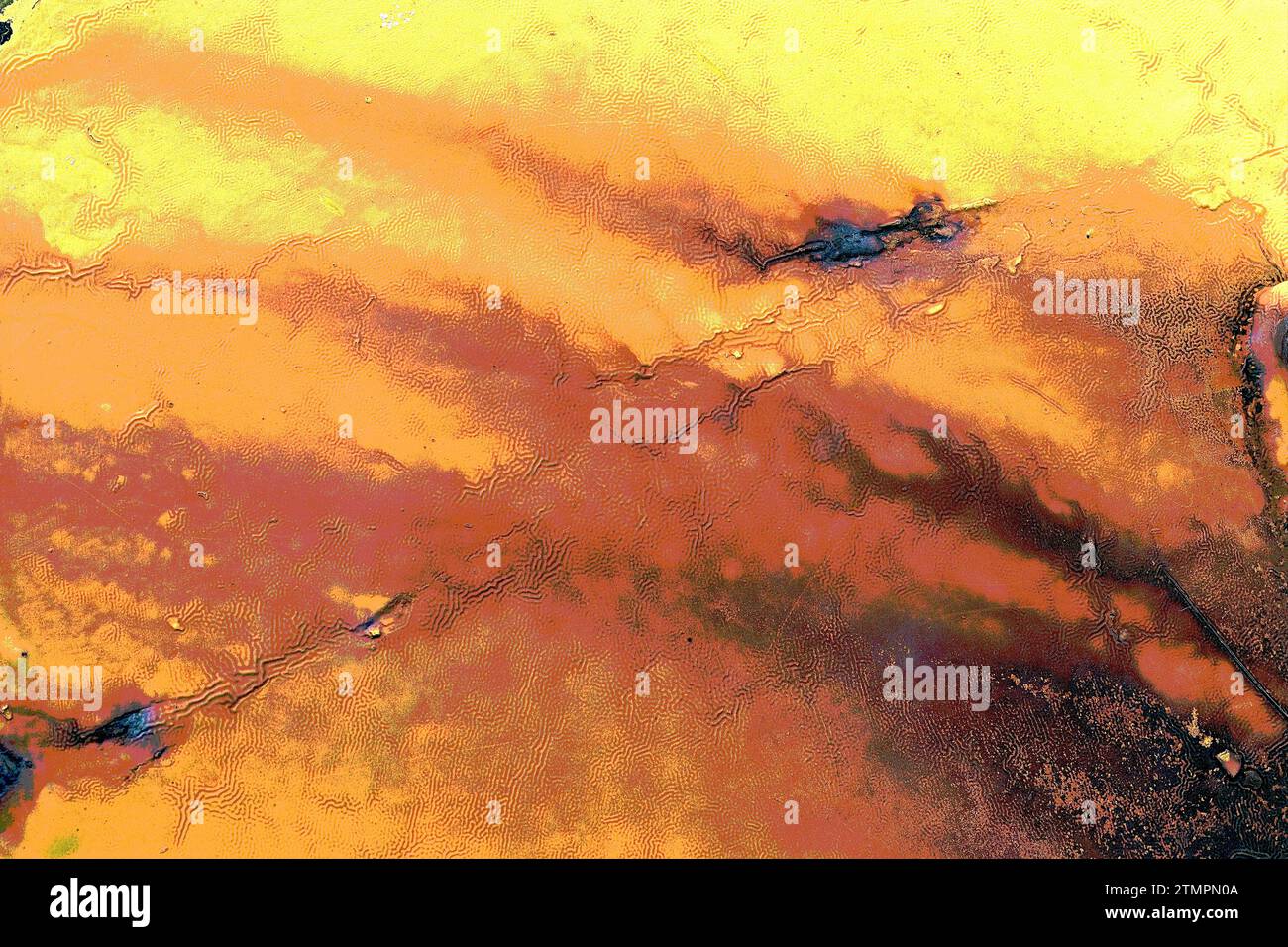 Abstract pattern of rust and corrosion shown on a piece of sheet metal ...