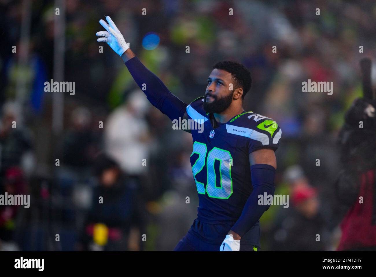 Seattle Seahawks safety Julian Love runs out to the field before an NFL ...