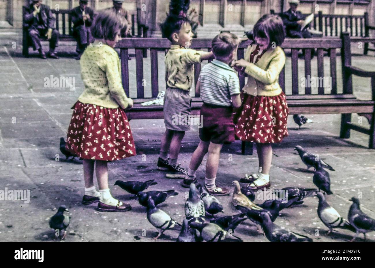 Young children playing on the street in an English town in the 1970s ...