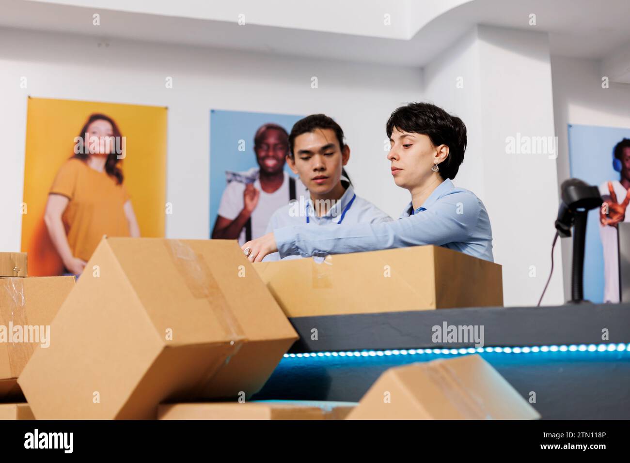 Delivery man putting carton boxes hi-res stock photography and images ...