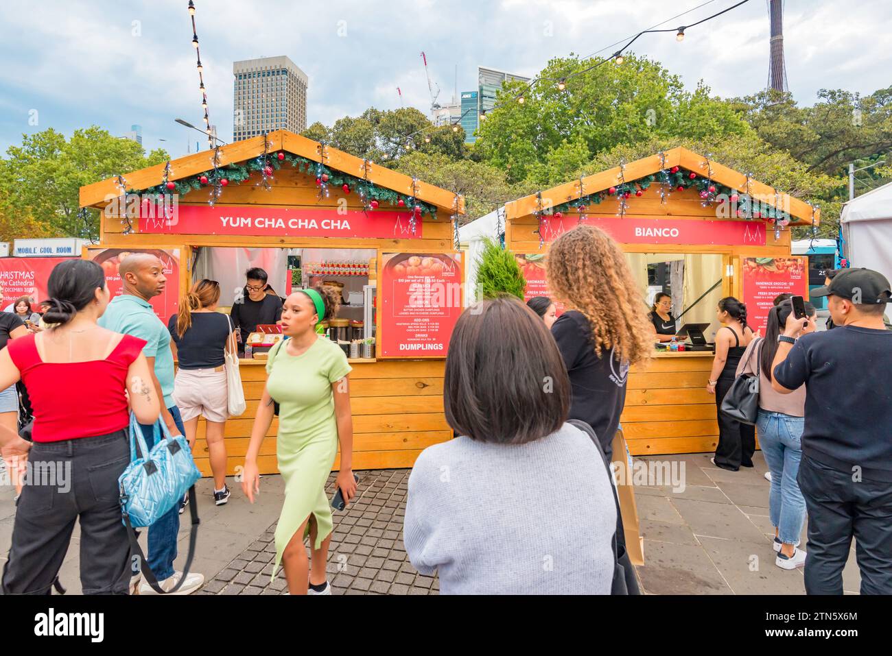 People queuing up for Asian and Italian takeaway food at the Christmas ...