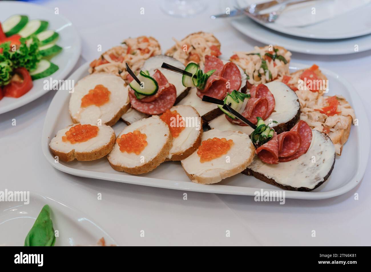 Canape with red caviar. Festive buffet Stock Photo - Alamy