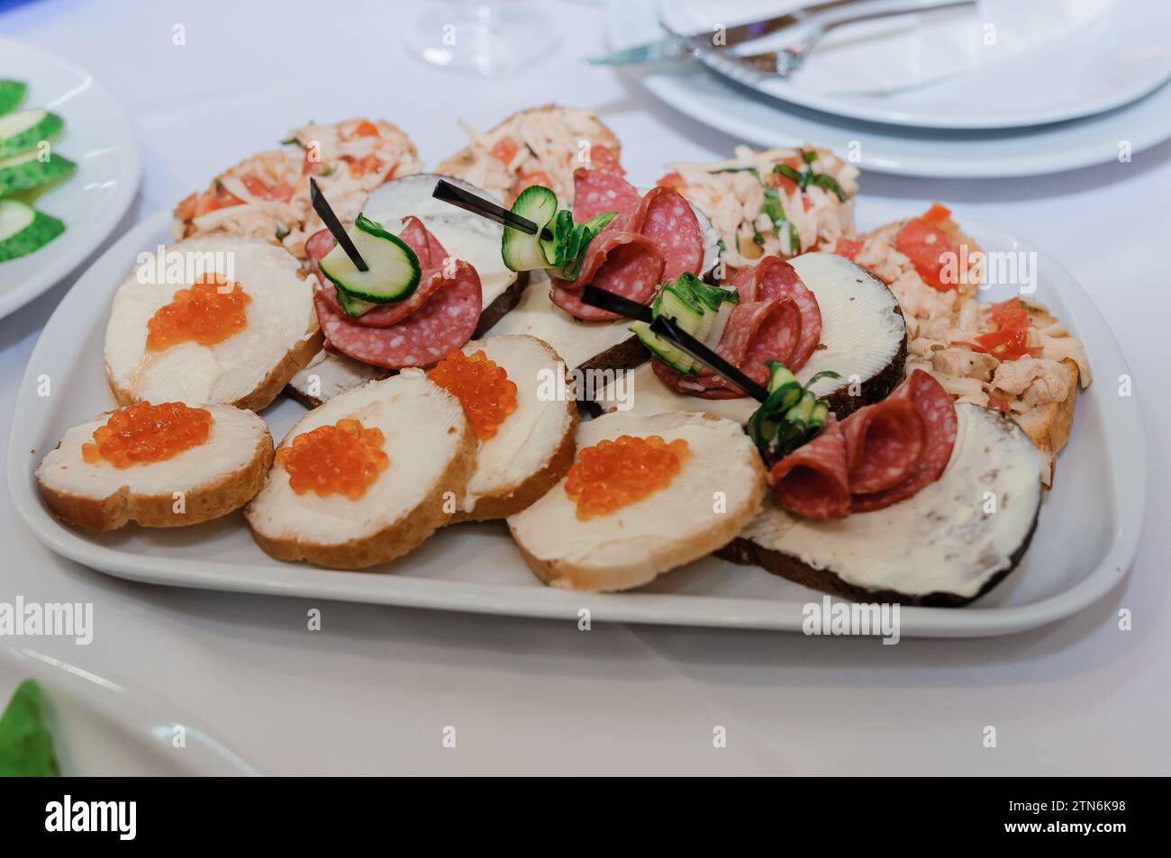 Canape with red caviar. Festive buffet Stock Photo - Alamy