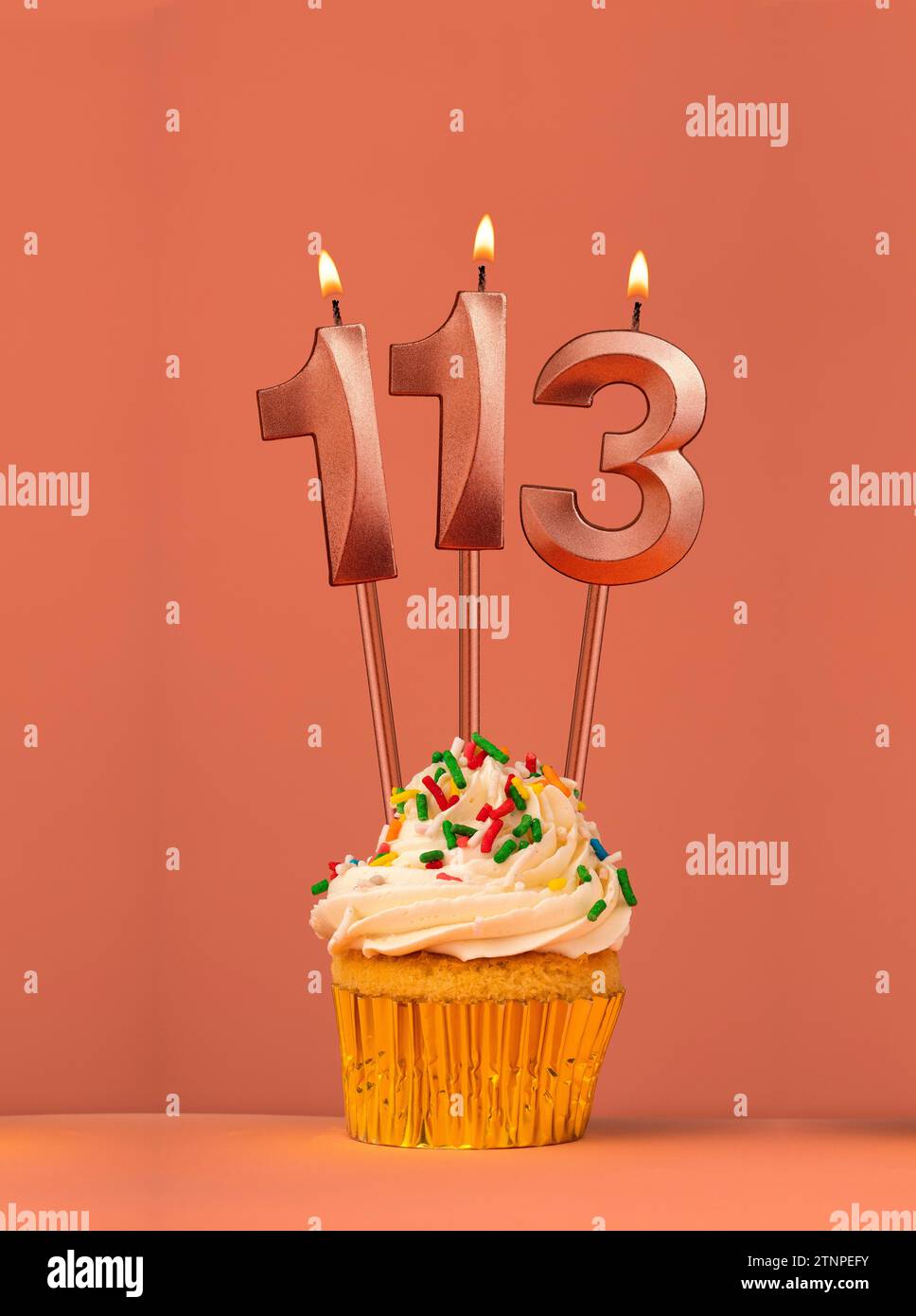Birthday cake with candle number 113 - Coral fusion background Stock ...