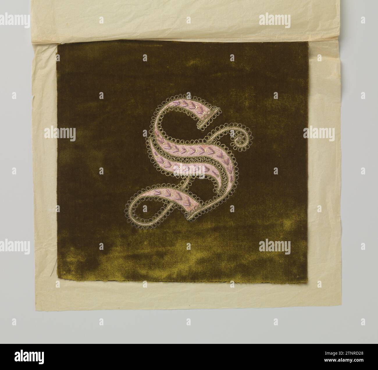 Green velvet with letter s embroidered in pink silk and gold thread ...