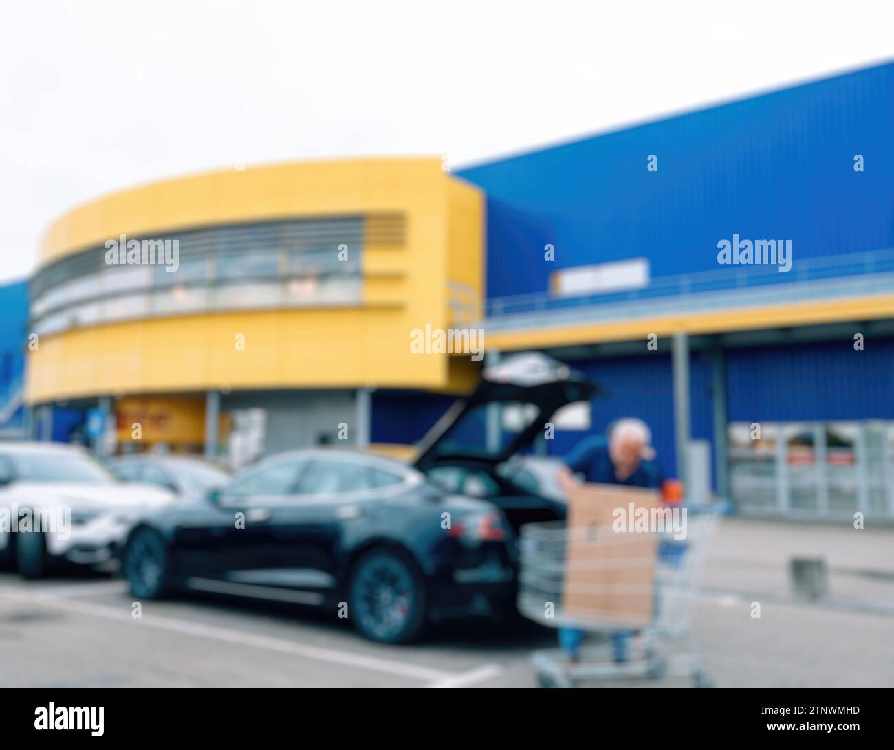 Paris, France - Aug 31, 2023: A defocused view captures a male loading ...