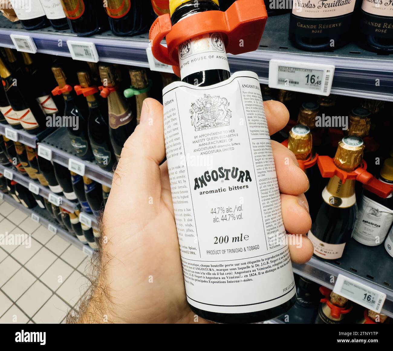 Paris, France - Nov 10, 2023: A customer prepares for holiday and ...