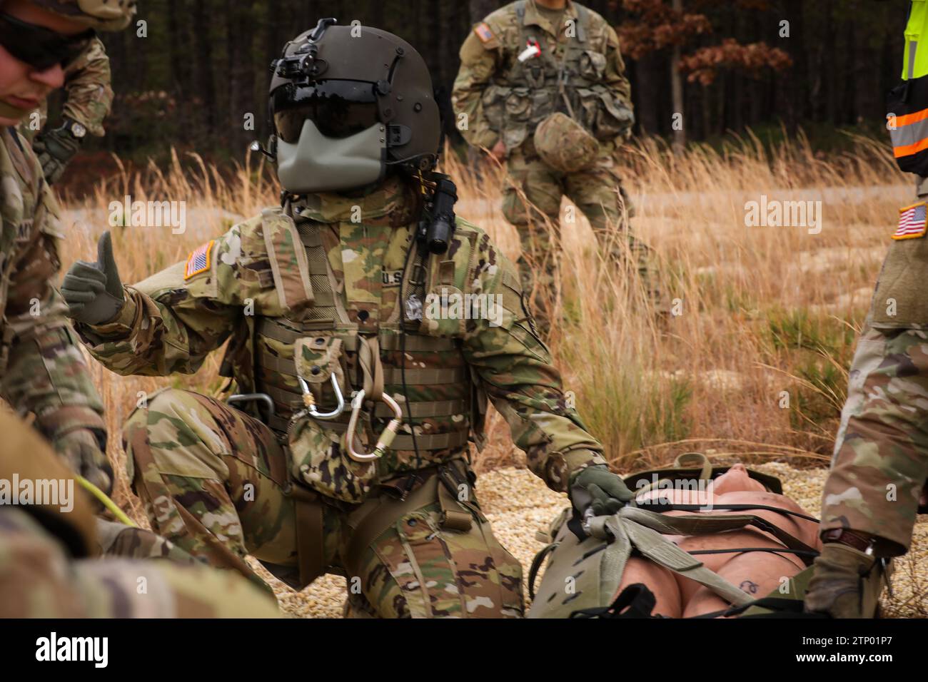 U.S. Army UH-60L Black Hawk helicopter crew chiefs with Charlie Company ...