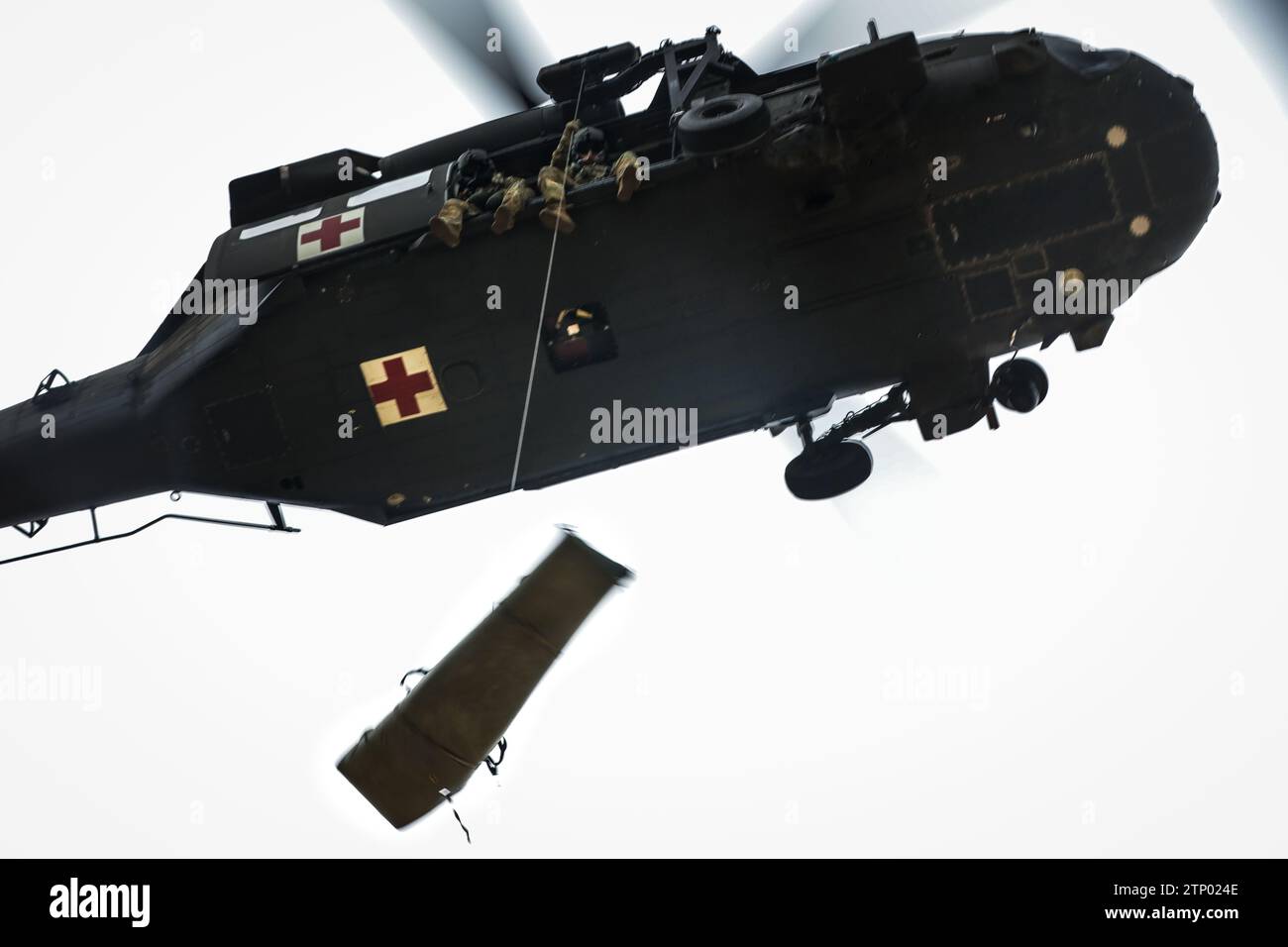 U.S. Army UH-60L Black Hawk helicopter crew chiefs with Charlie Company ...