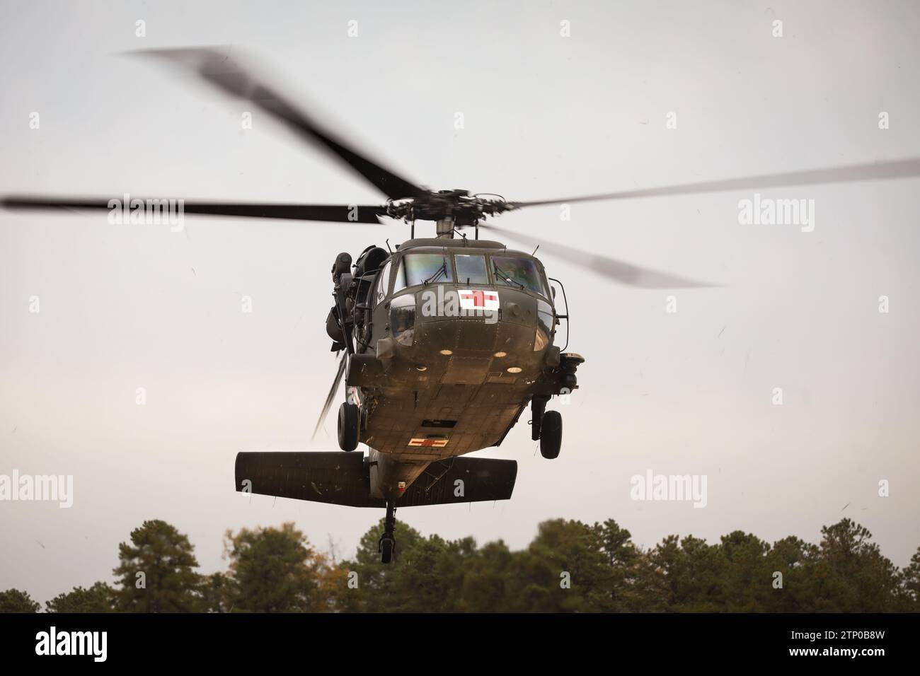 U.S. Army UH-60L Black Hawk helicopter crew chiefs with Charlie Company ...