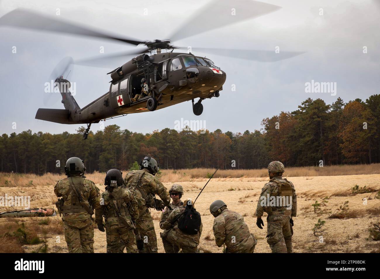U.S. Army UH-60L Black Hawk helicopter crew chiefs with Charlie Company ...