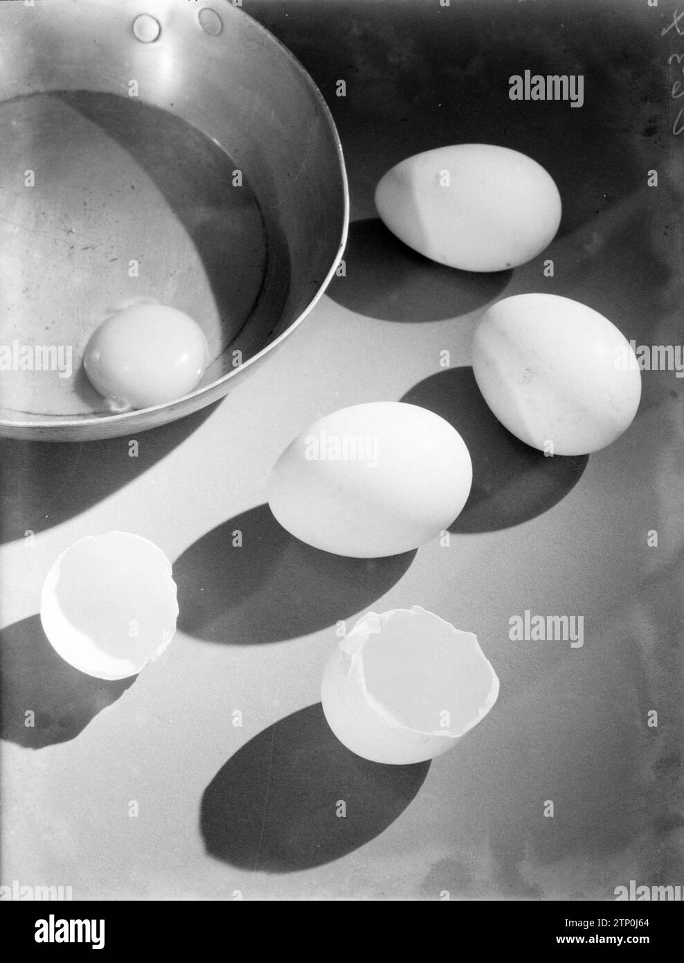 Still life of a pan and eggs ca. 1932 Stock Photo - Alamy