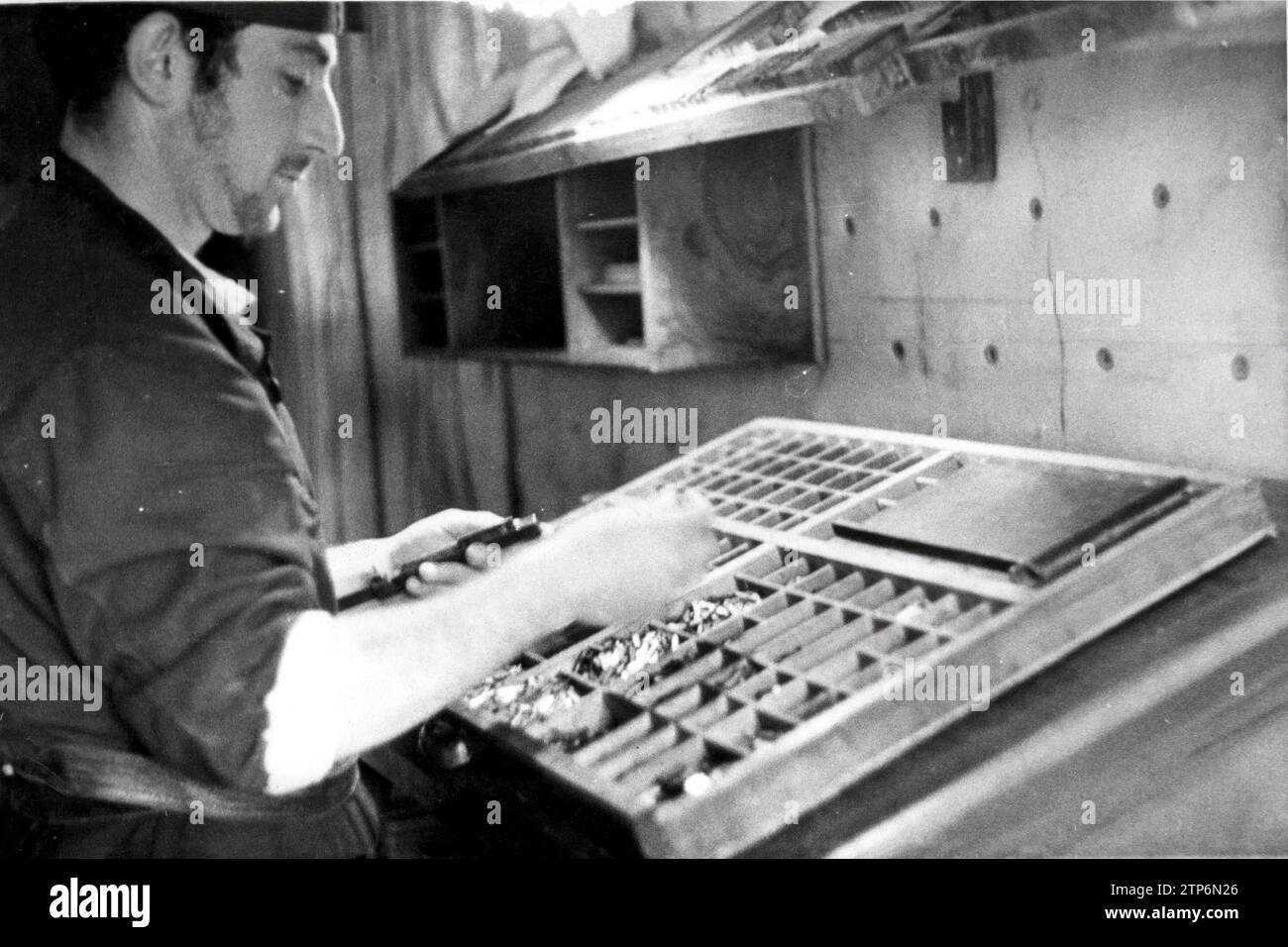 10/01/1936. A typesetter working inside the printing car of the ...