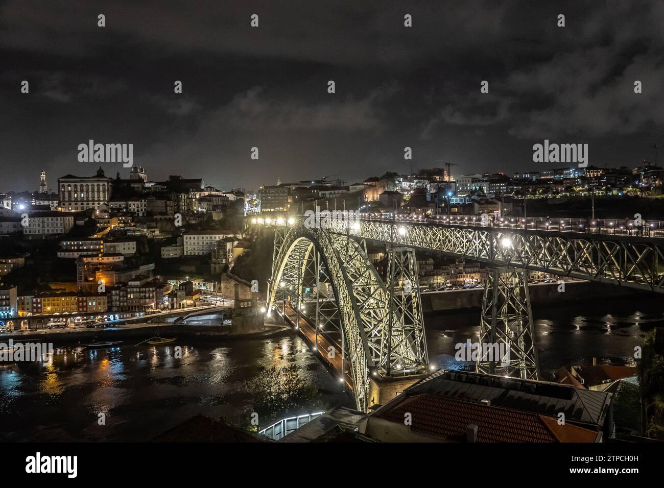 Night and illuminated image of the Don Luis I Bridge in the city of ...