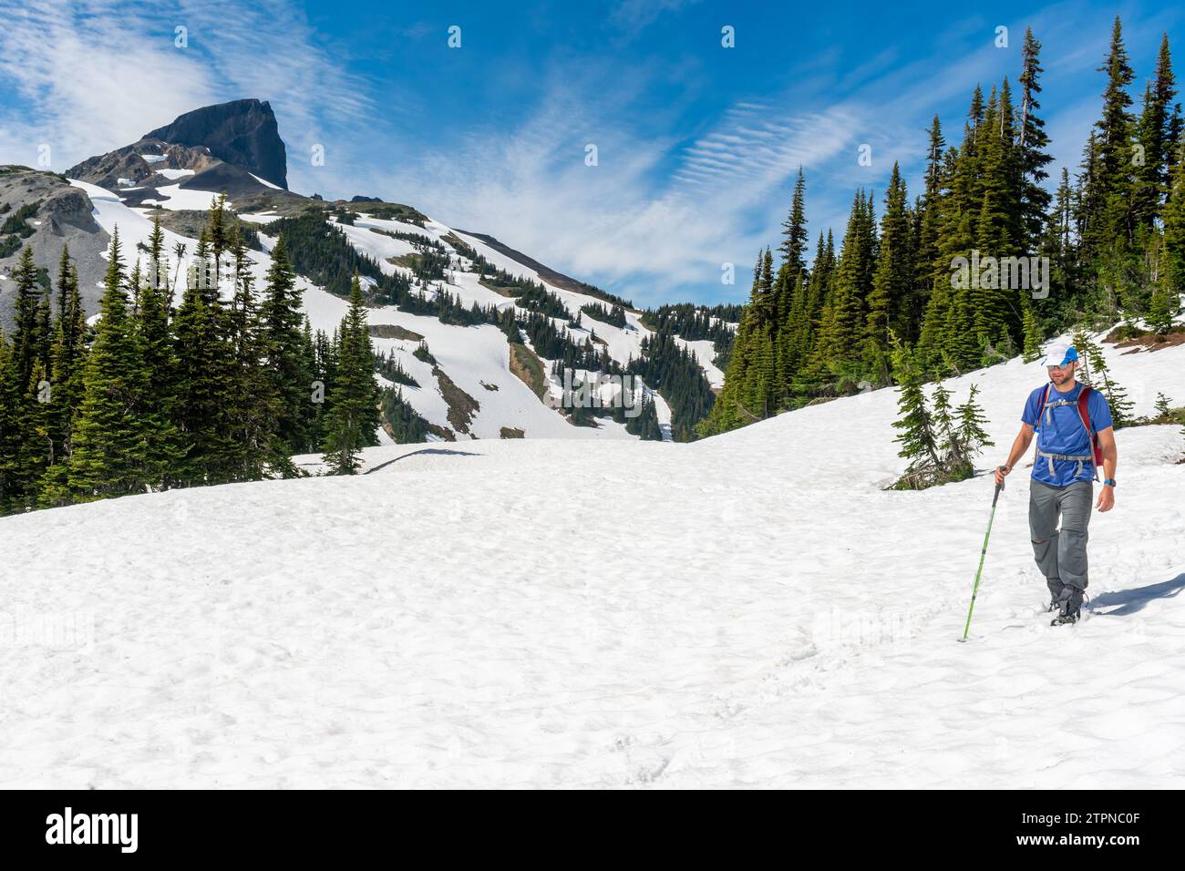 Adventurer makes his way on Panorama Ridge with the iconic Black Tusk ...