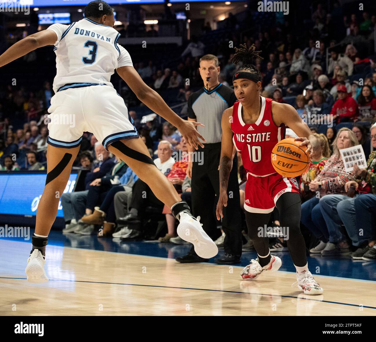 North Carolina State guard Aziaha James (10) dribbles past Old Dominion ...