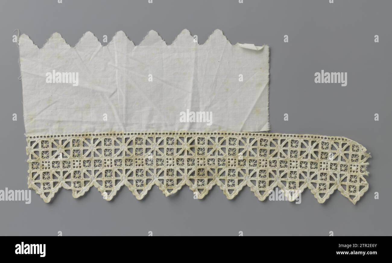 Strip of needle side with spiders in squares and a zigza edge ...