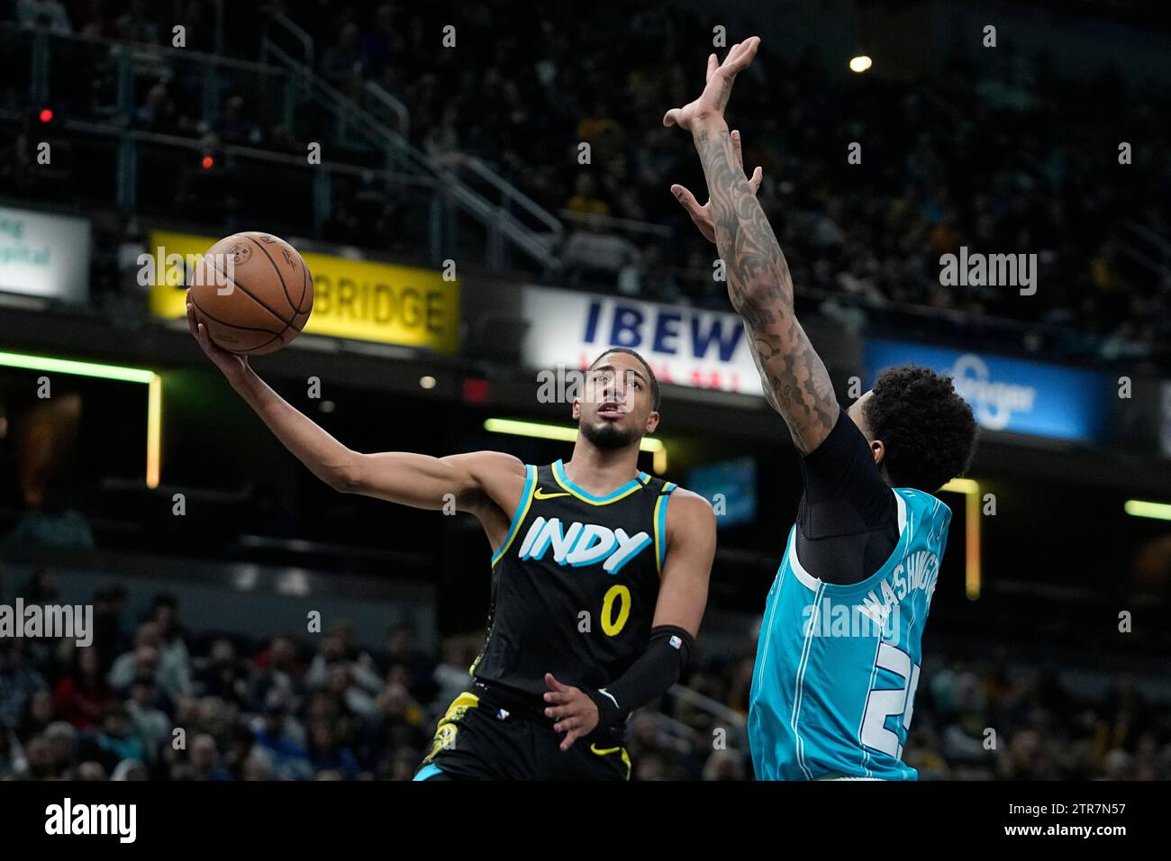 Indiana Pacers' Tyrese Haliburton (0) shoots against Charlotte Hornets ... Indiana Pacers' Tyrese Haliburton (0) shoots against Charlotte Hornets ...