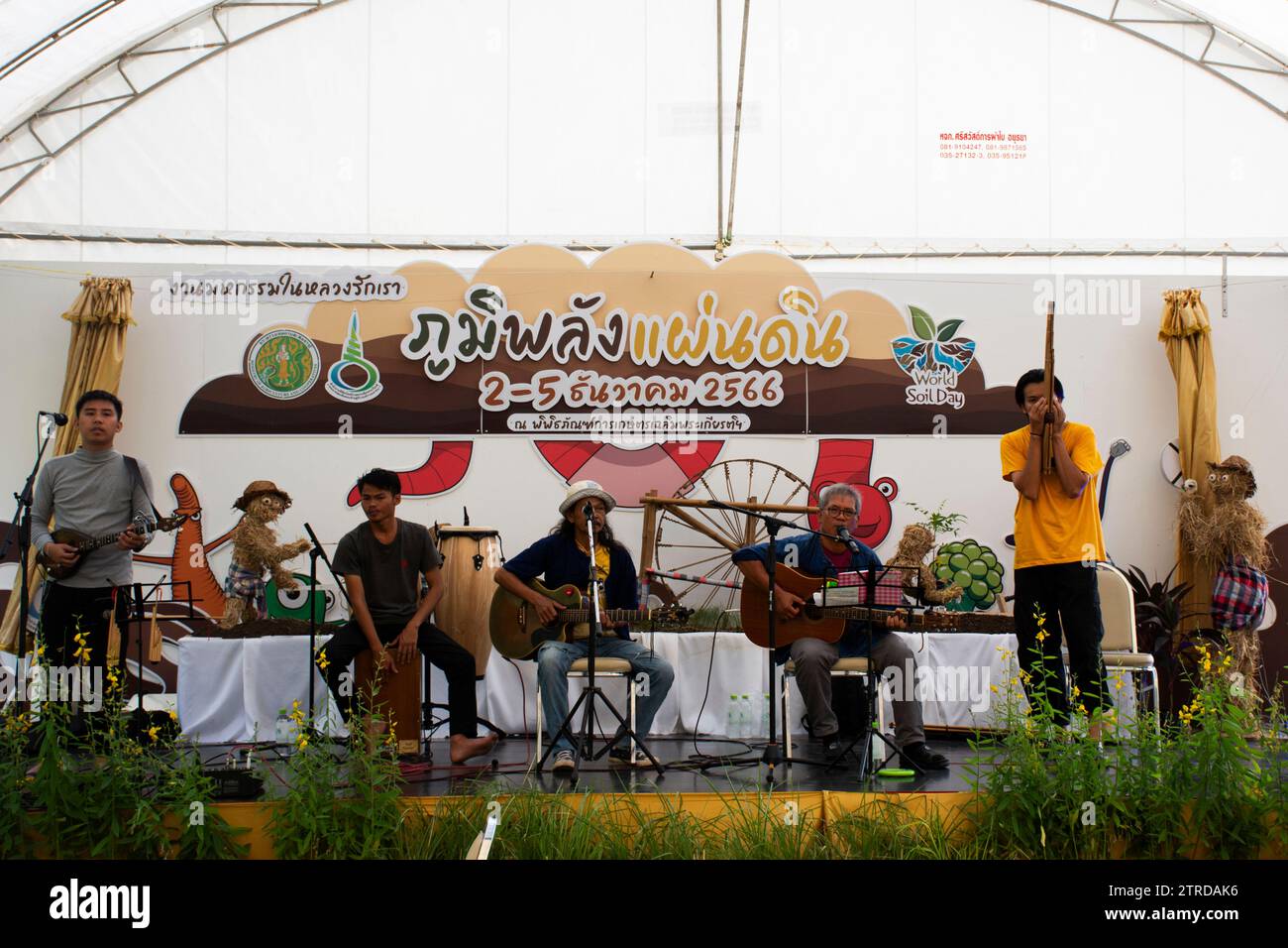 Traditional thai musical and isan instruments playing music concert on ...