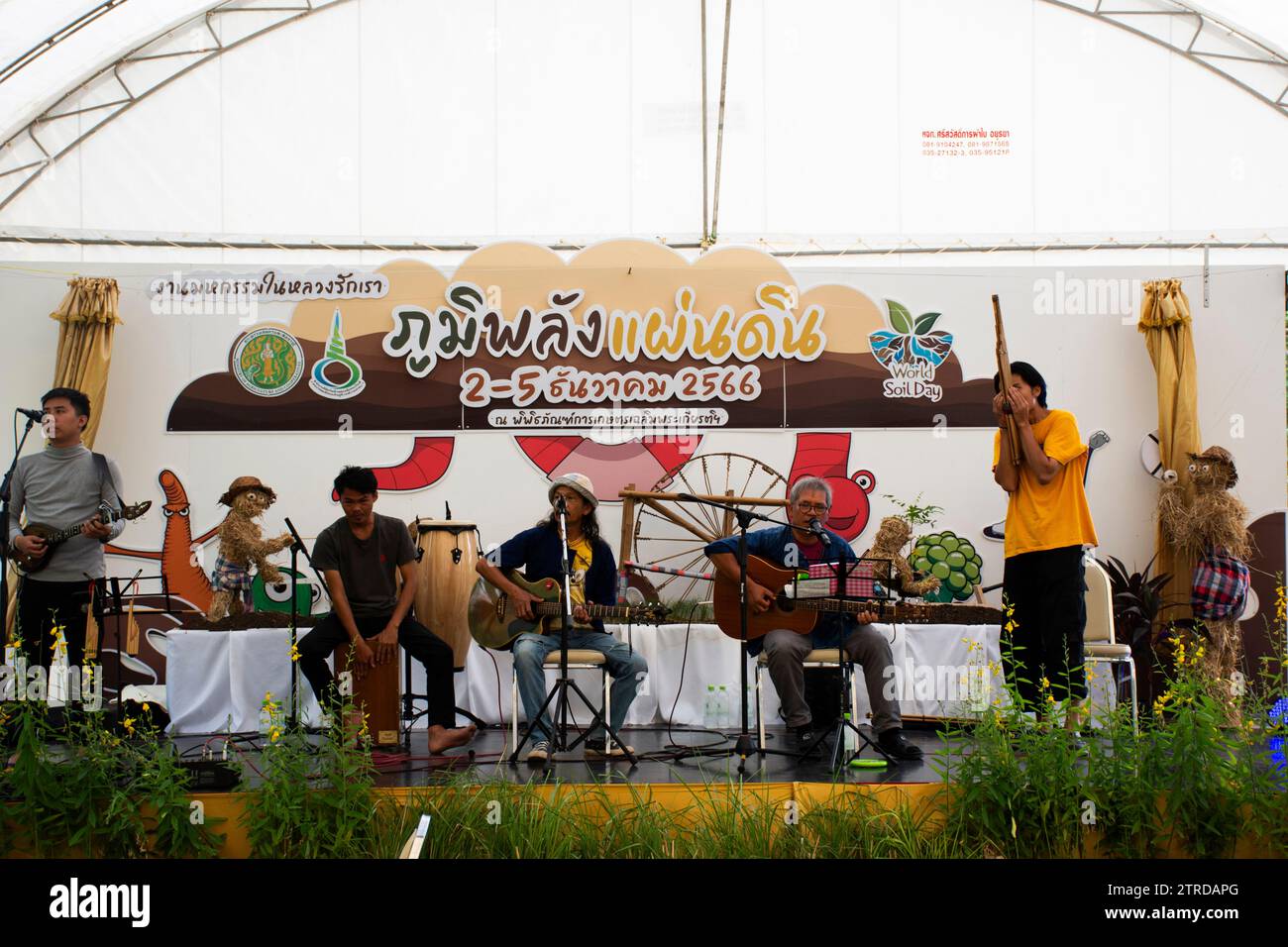 Traditional thai musical and isan instruments playing music concert on ...