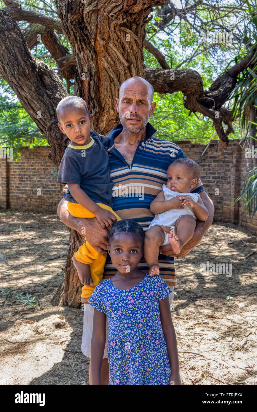 portrait of mixed ethnicity family, caucasian african, old father and ...