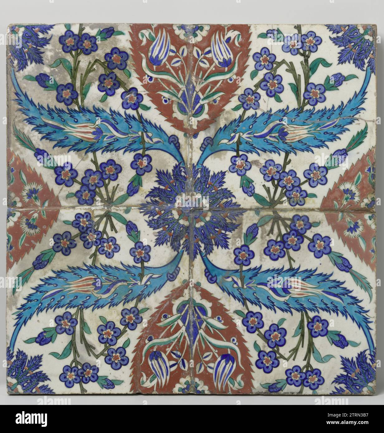 Tile tableau of four with a coherent pattern of palmets, leaf shapes ...