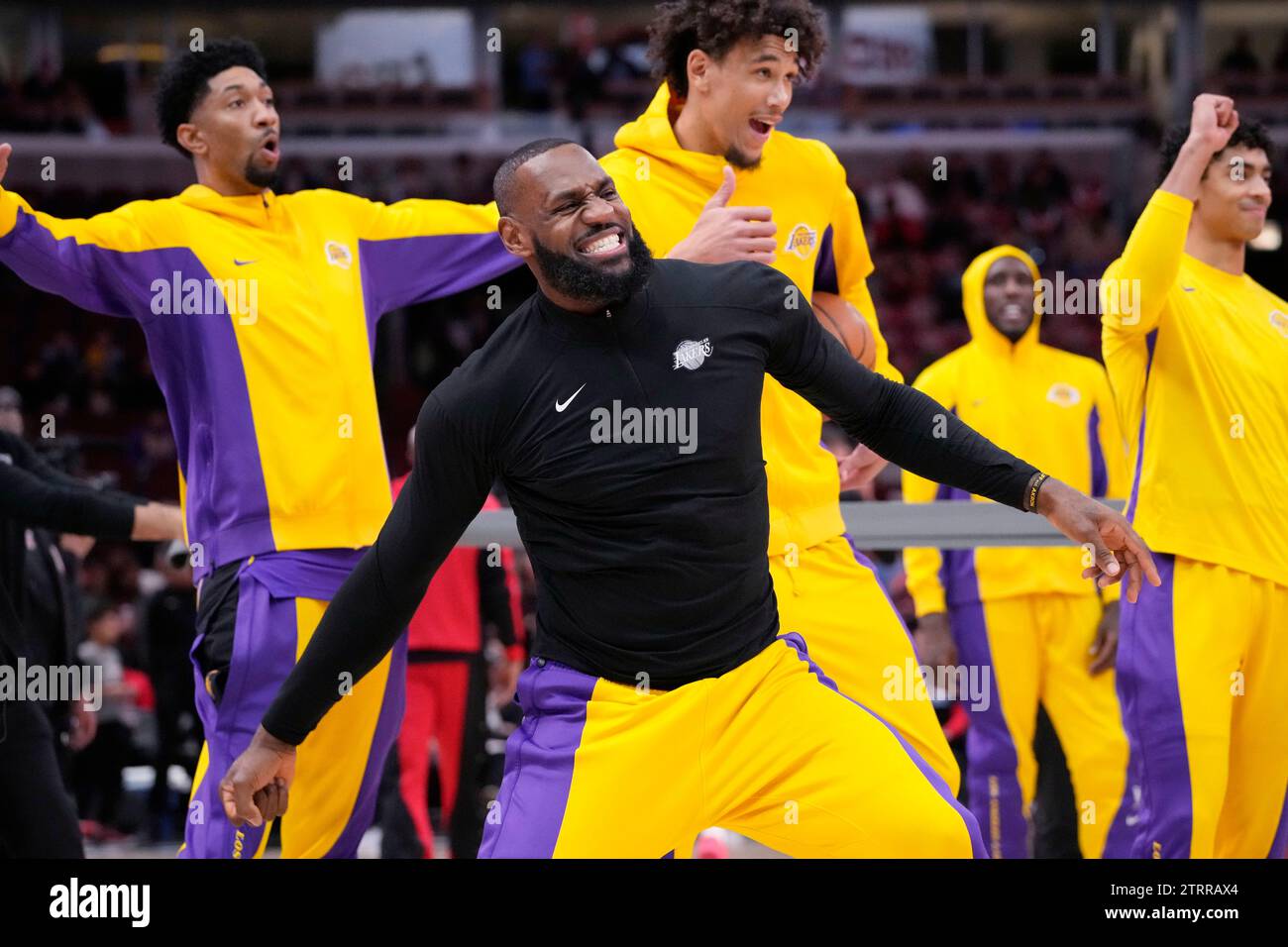 Los Angeles Lakers forward LeBron James, center, reacts as he warms up ...