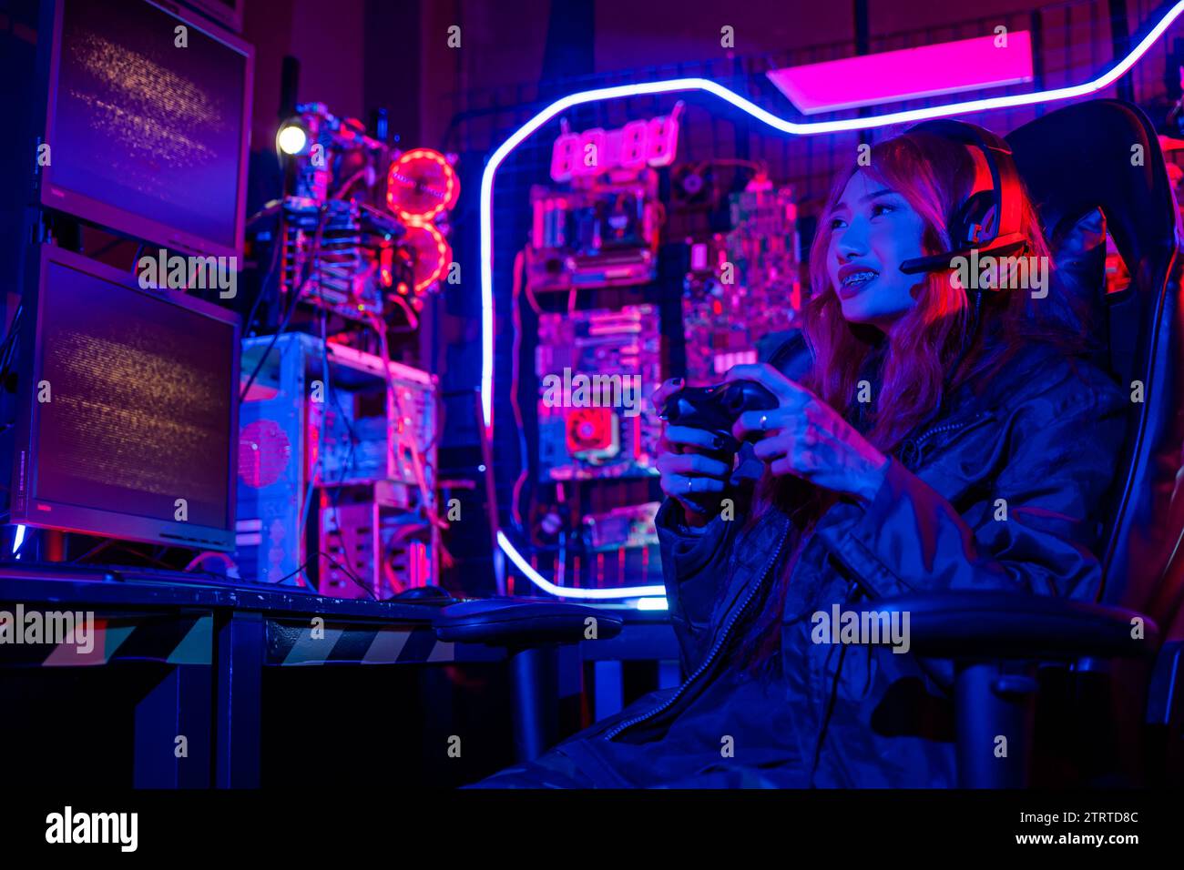 Gamer using joystick controller for virtual tournament plays online ...