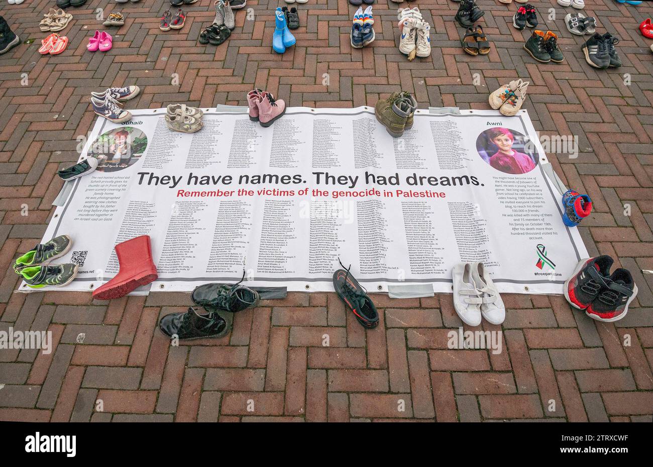 ‘They have names. They had dreams.' Large poster naming some of those ...
