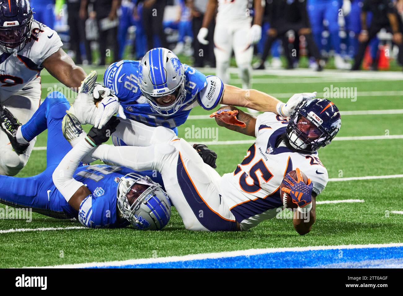 Denver Broncos running back Samaje Perine (25) is tackled by Detroit ...