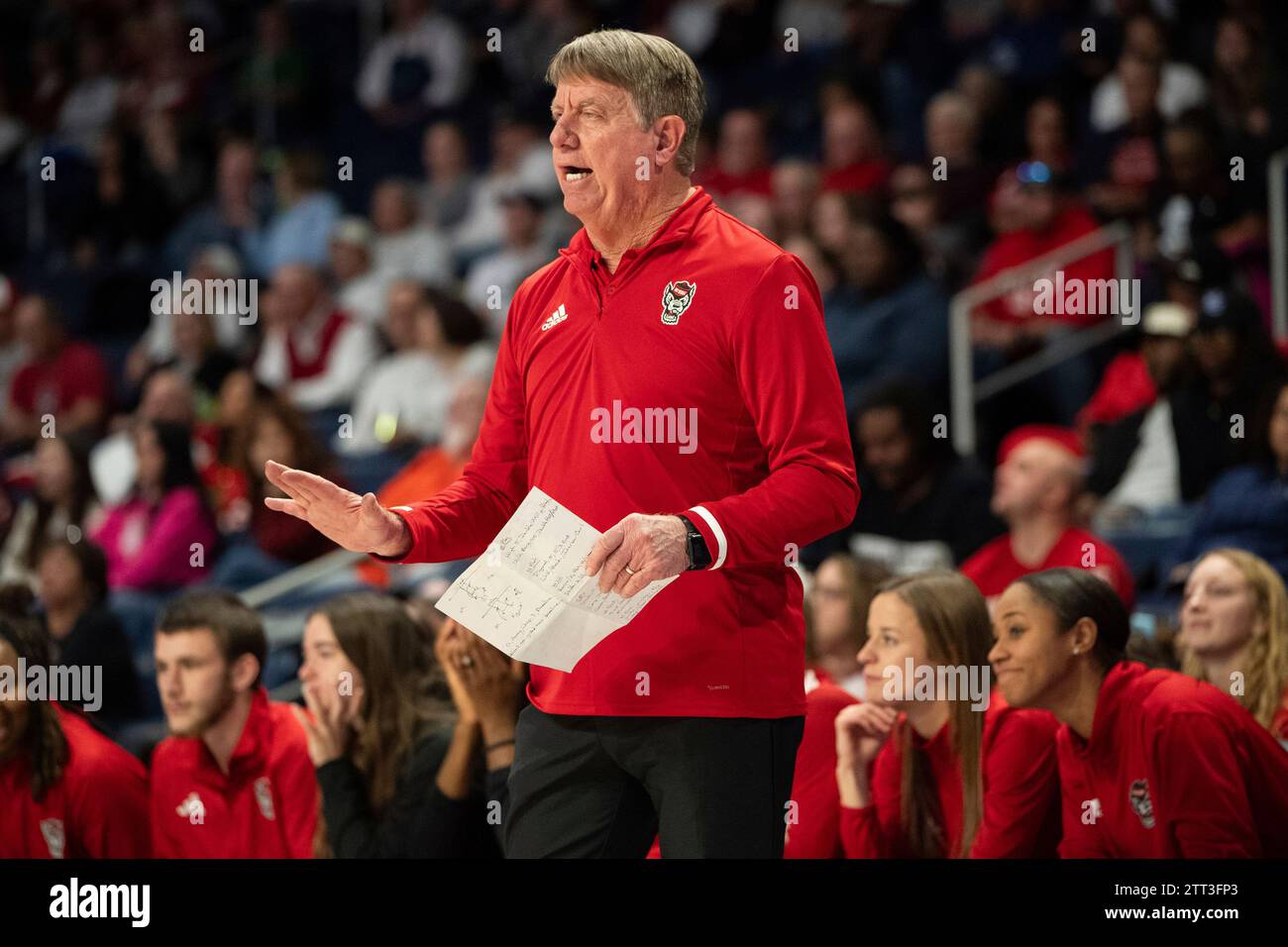 North Carolina State coach Wes Moore calls out a play to the team ...