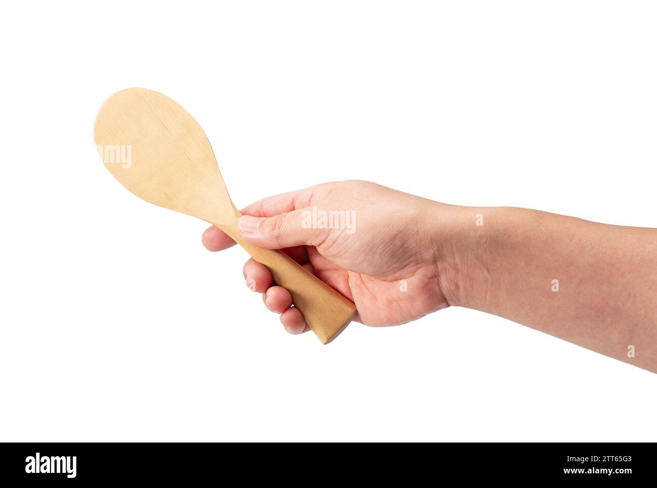 Wooden rice scoop held in hand isolated on white background. Shamoji is ...