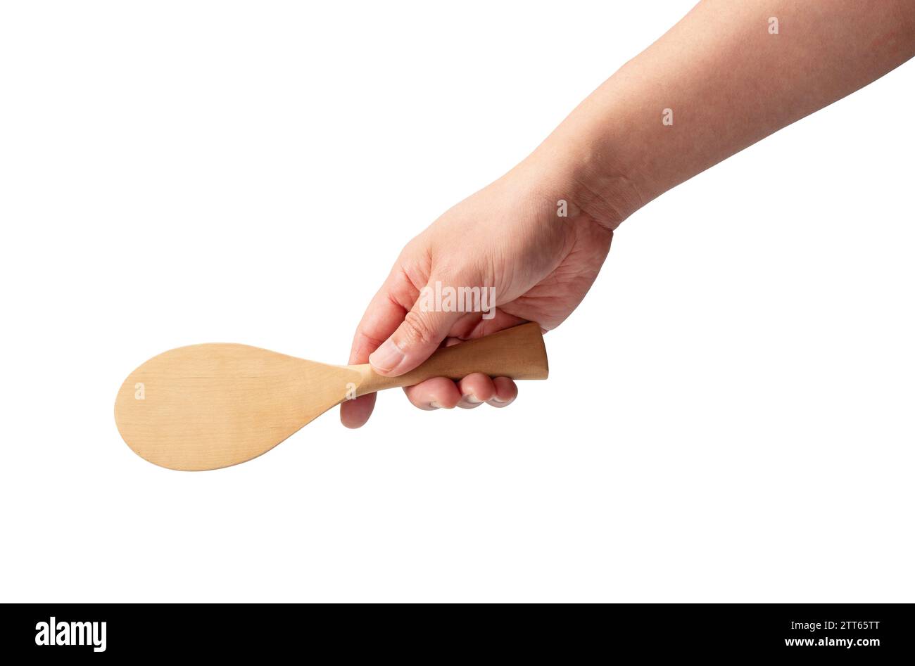 Wooden rice scoop held in hand isolated on white background. Shamoji is ...