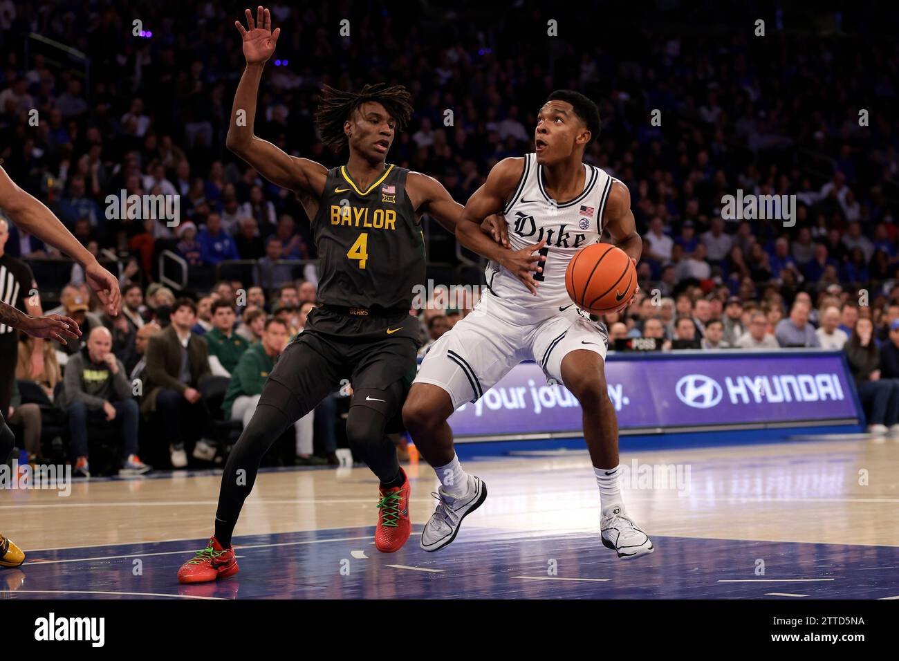 Duke guard Caleb Foster (1) drives past Baylor guard Ja'Kobe Walter (4 ...