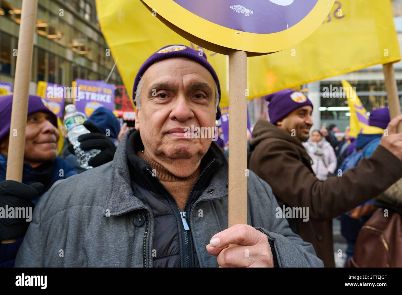 New York, New York, USA. 20th Dec, 2023. Members of the 32BJ union ...