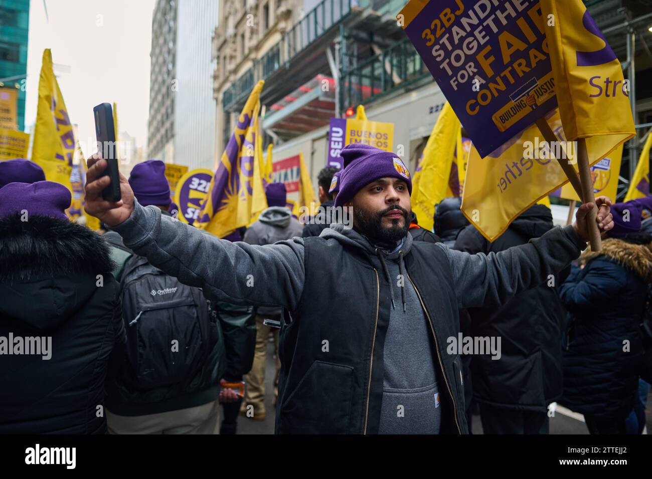 New York, New York, USA. 20th Dec, 2023. Members of the 32BJ union ...