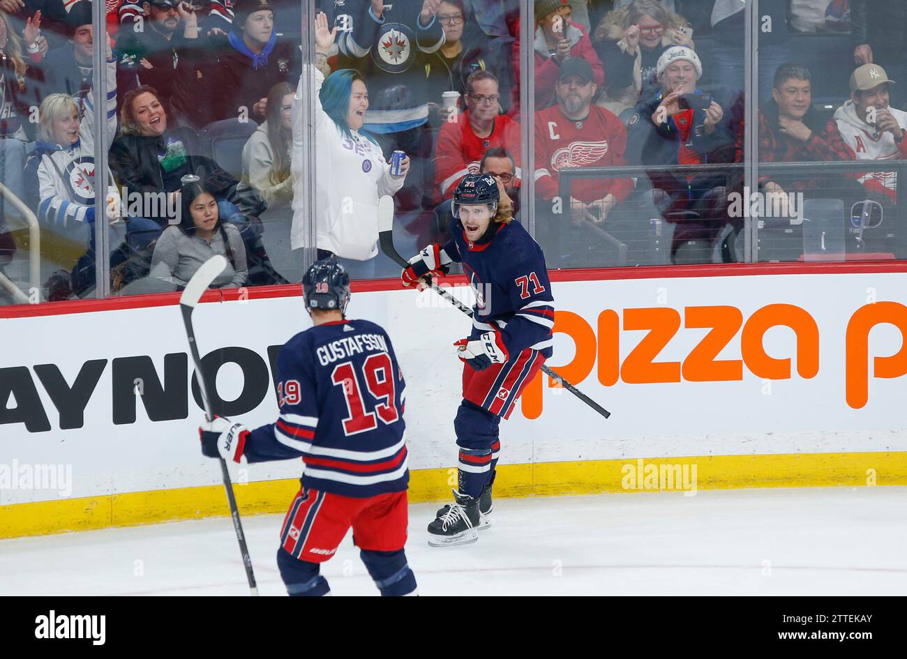 Winnipeg Jets' Axel Jonsson-Fjallby (71) and David Gustafsson (19) celebrate a goal against the ...