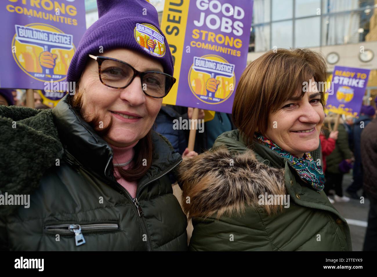 New York, New York, USA. 20th Dec, 2023. Members of the 32BJ union ...