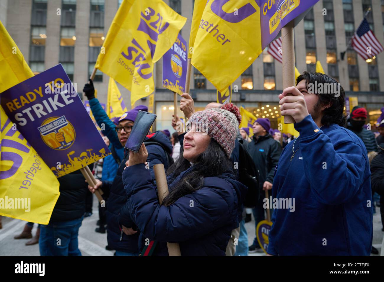 New York, New York, USA. 20th Dec, 2023. Members of the 32BJ union ...