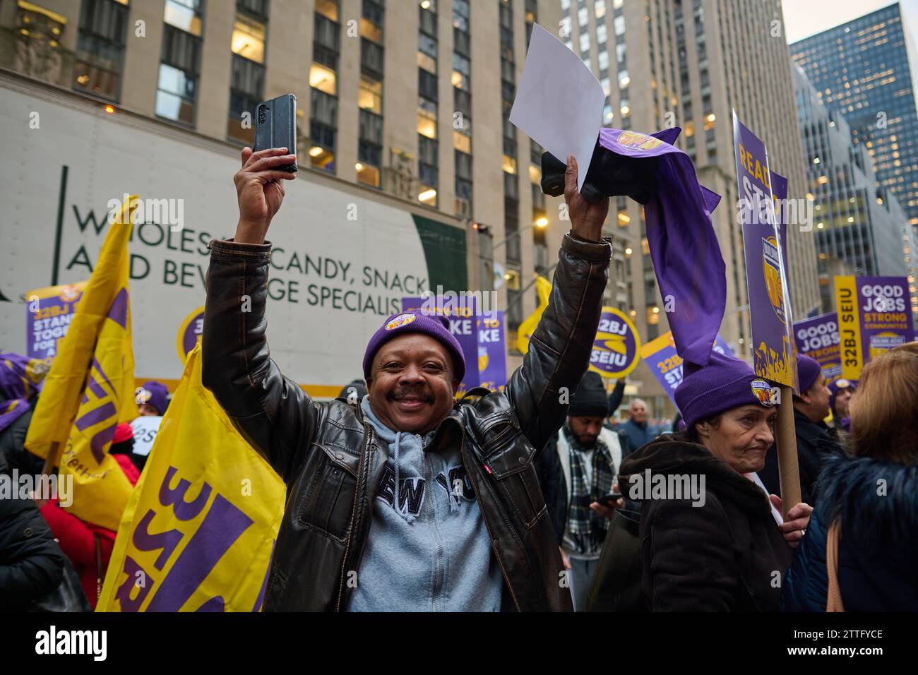 New York, New York, USA. 20th Dec, 2023. Members of the 32BJ union ...