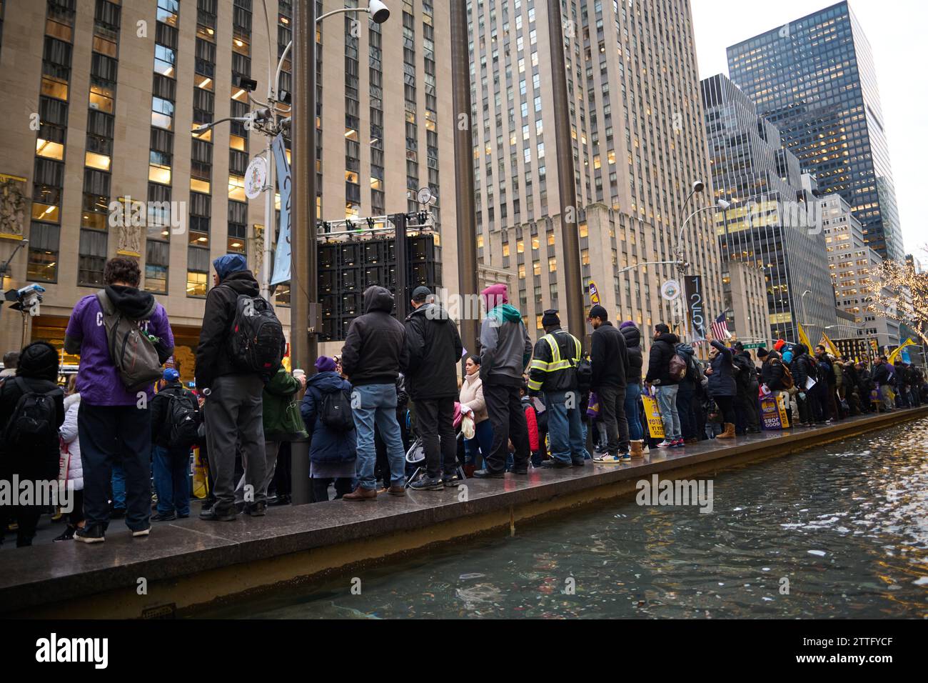 New York, New York, USA. 20th Dec, 2023. Members of the 32BJ union ...