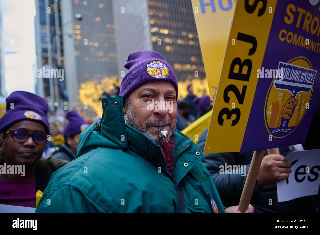 New York, New York, USA. 20th Dec, 2023. Members of the 32BJ union ...
